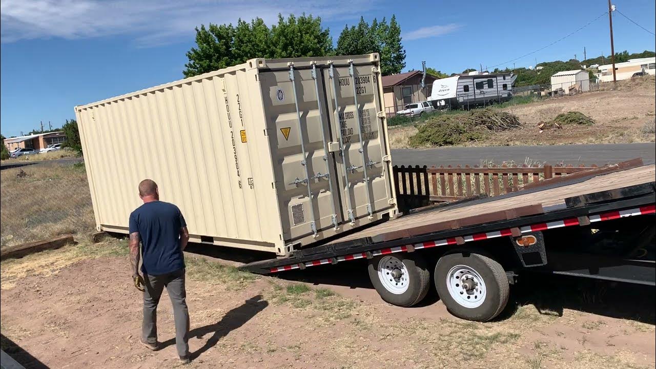 Unloading a 20 foot shipping container - YouTube