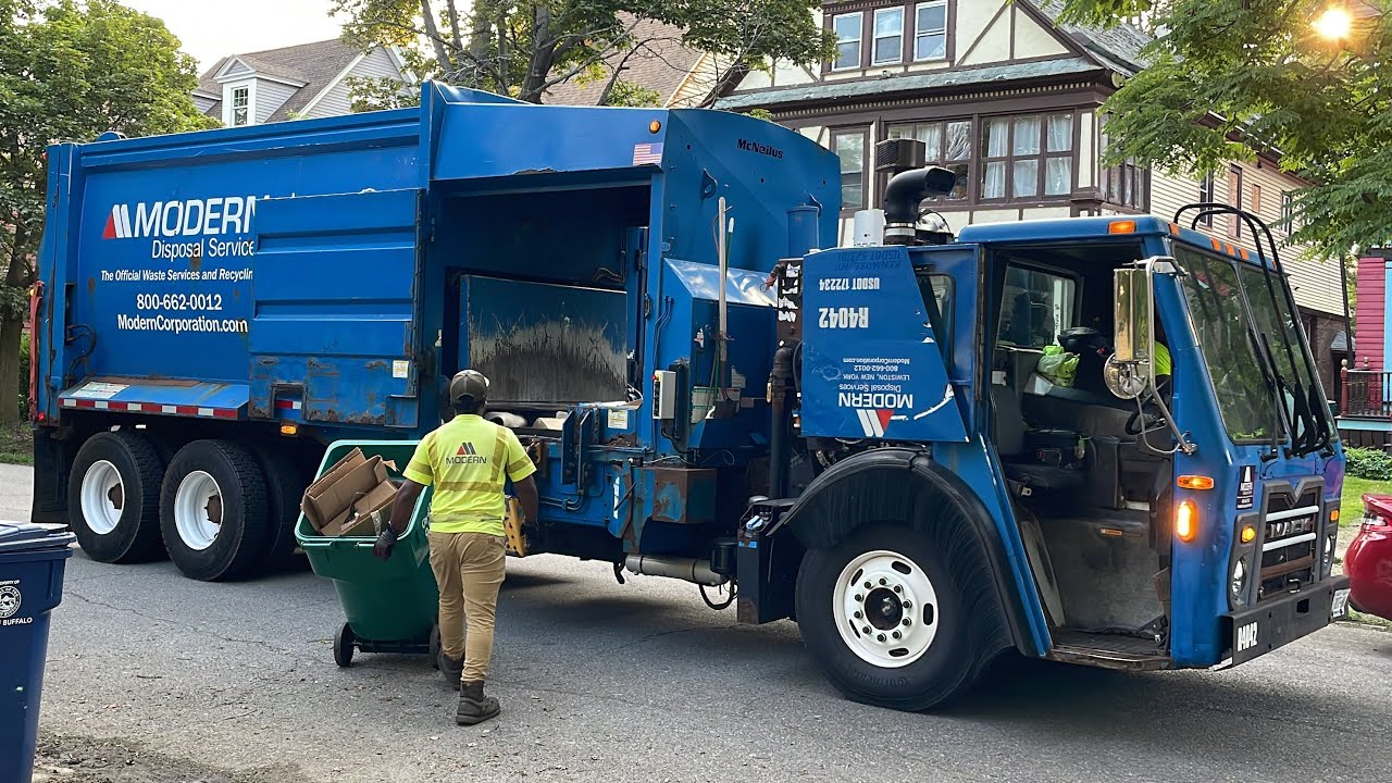 2 Modern Disposal Mack Drop Frame McNeilus Side Loader Garbage Trucks ...