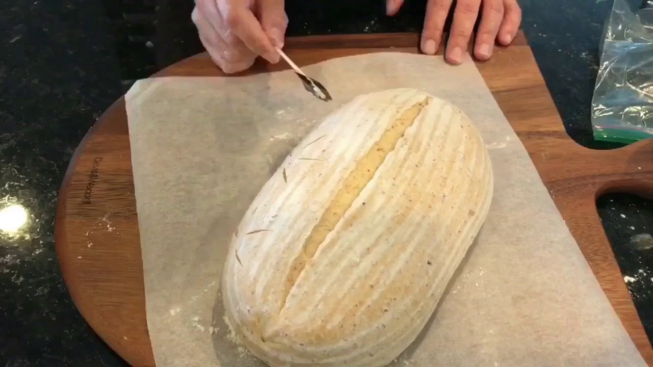 Scoring / slashing bread dough - YouTube