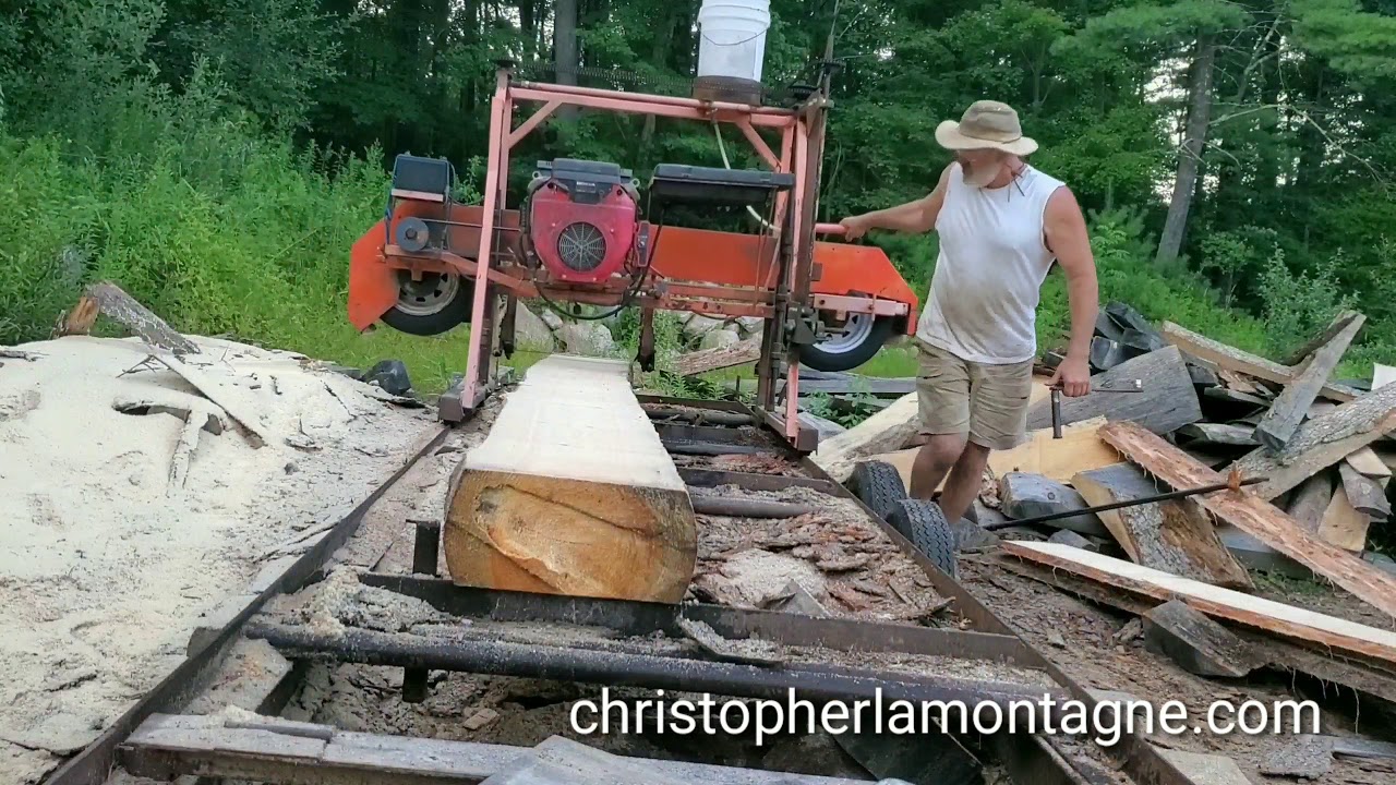 Making a beam on homemade sawmill - YouTube