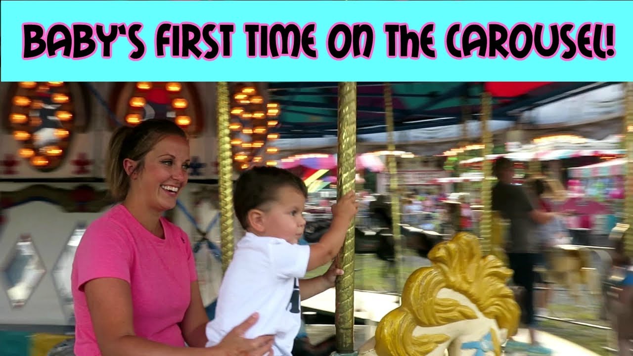 BABY'S FIRST TIME ON THE CAROUSEL! - YouTube