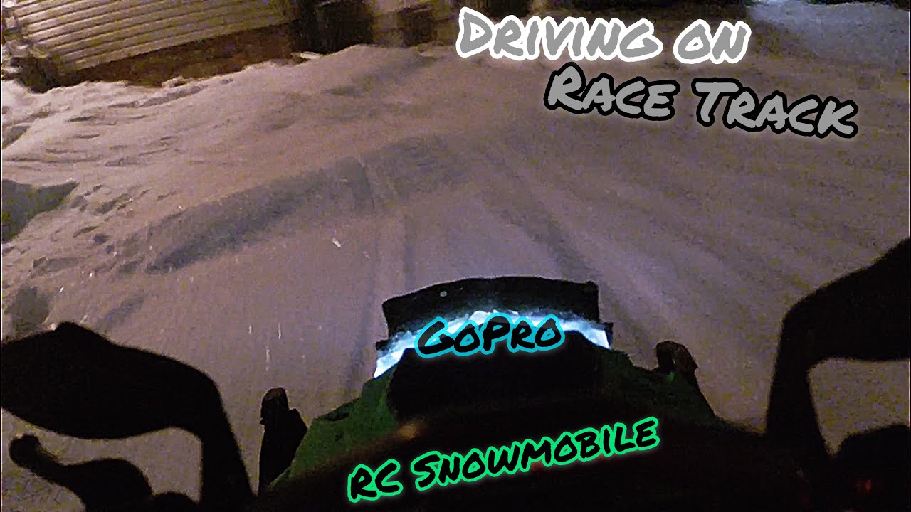 RC snowmobile driving on race track at night EXTRA footage - YouTube