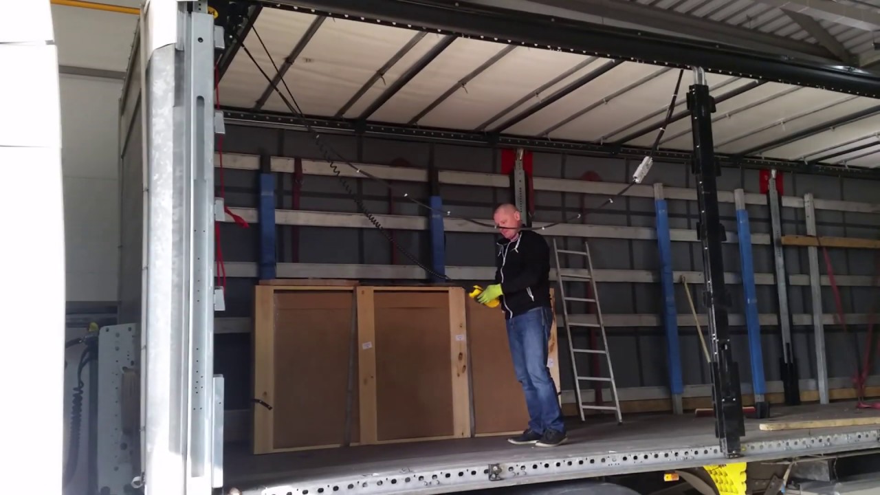 Unloading heavy entrance door - YouTube