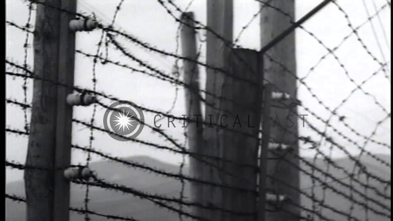 Wire-enclosed building of electric barbed wire fence at Natzweiler ...