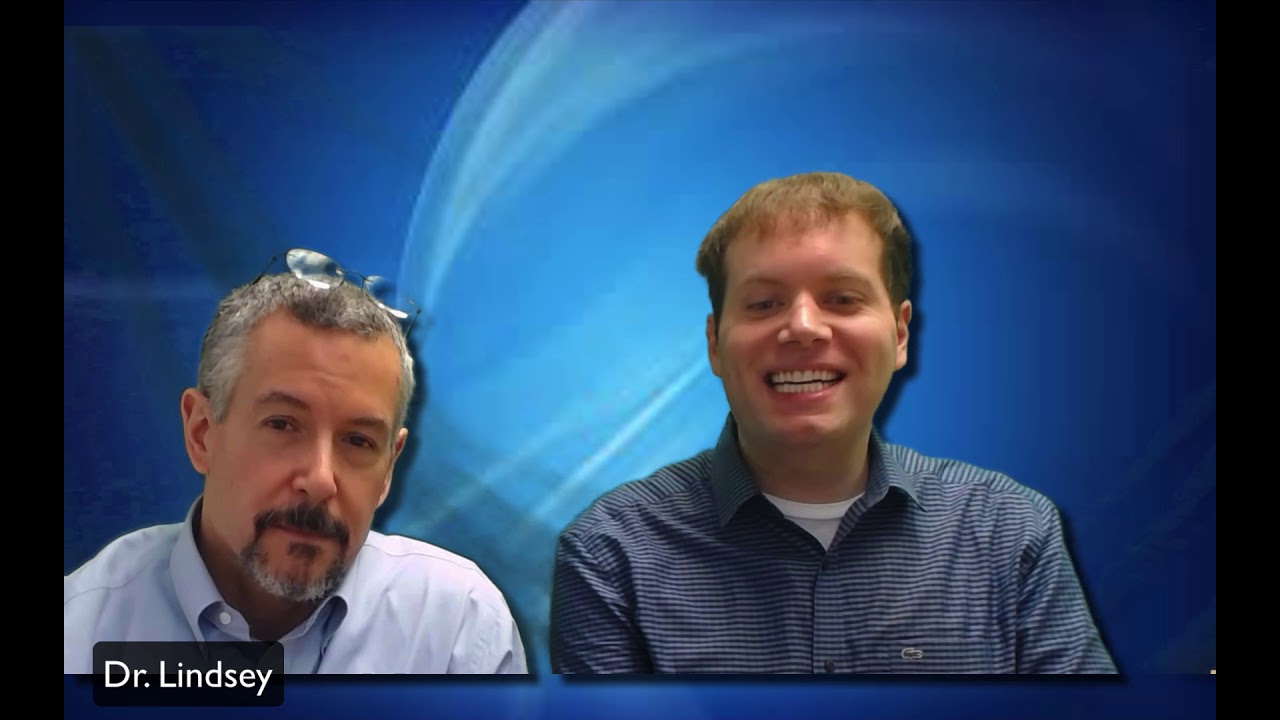 Dr. Lindsey speaking with Rhinoplasty patient in Washington DC after ...