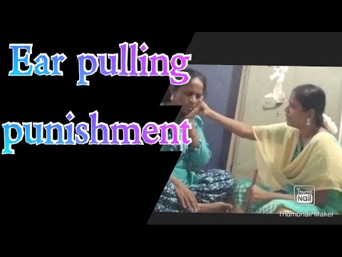 Ear pulling punishment - YouTube