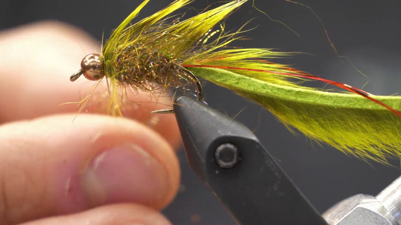 Chris Niccolls ties the Pine Squirrel Leech at Bow River Troutfitters ...