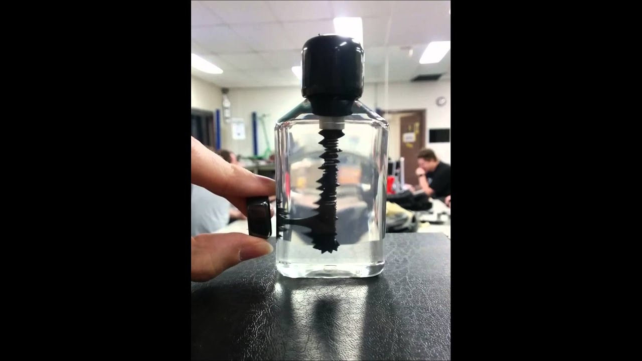 Ferrofluid (magnetic liquid) in a bottle looks like Venom from ...