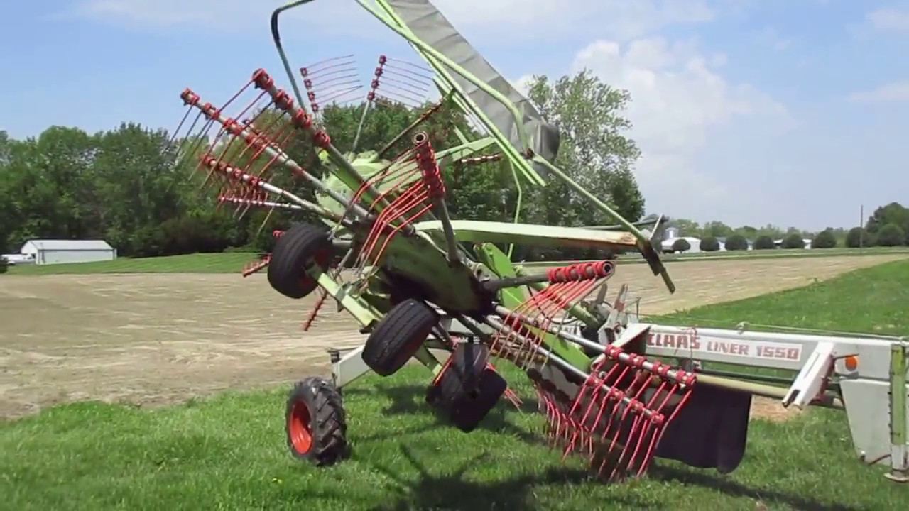 Big Iron Auctions Claas Twin Liner 1550 Rotary Rake 5-24-17 - YouTube
