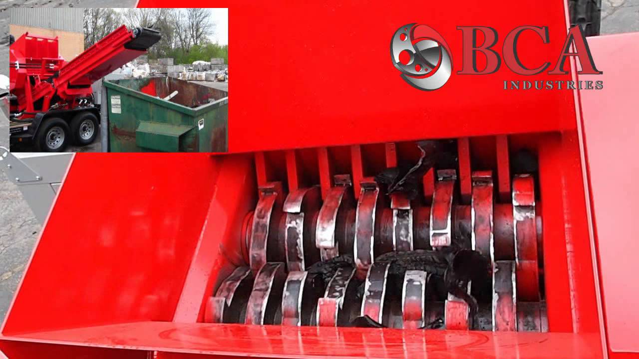 PD1000 shredder shredding automotive tires. - YouTube