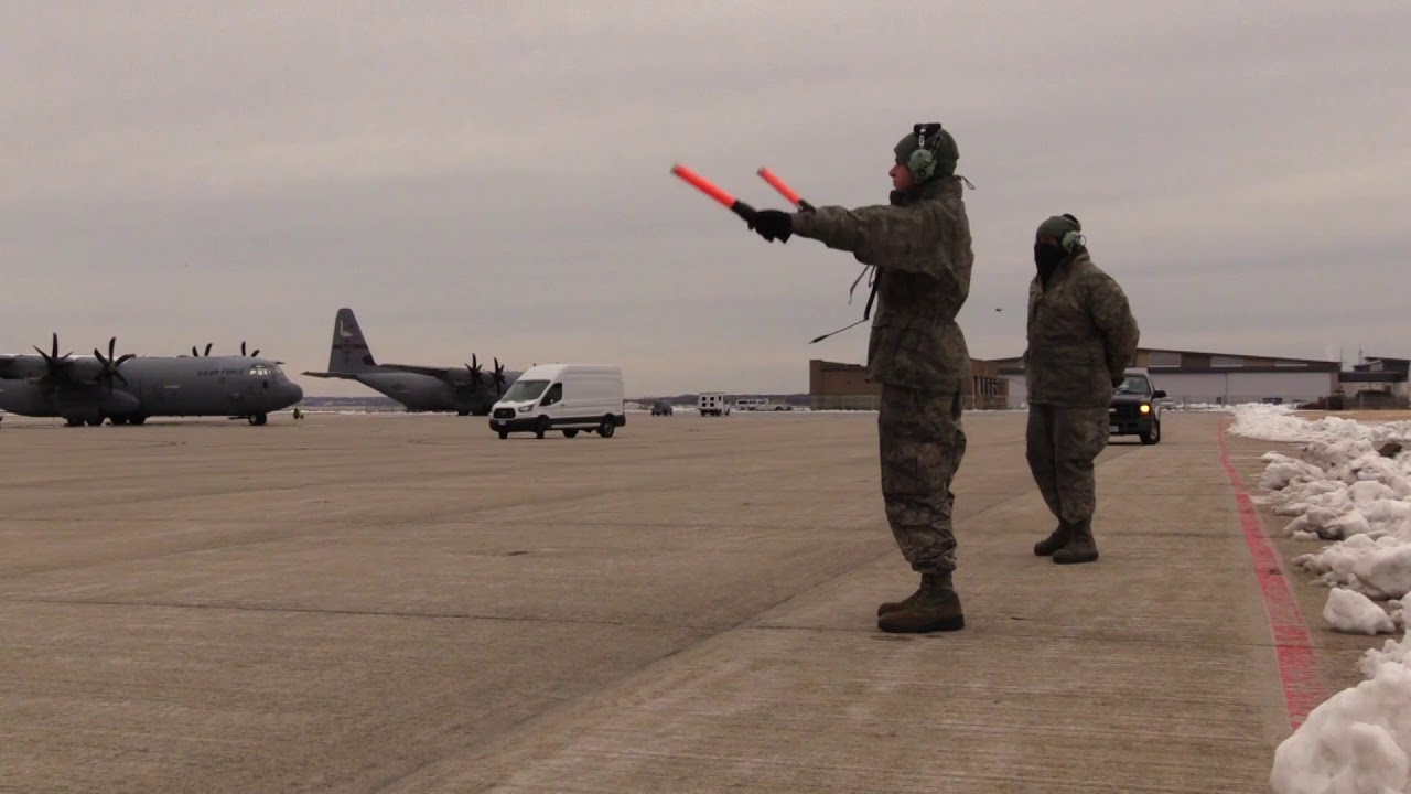 Airmen from the 143d Airlift Wing prepare a C-130J Super Hercules for ...