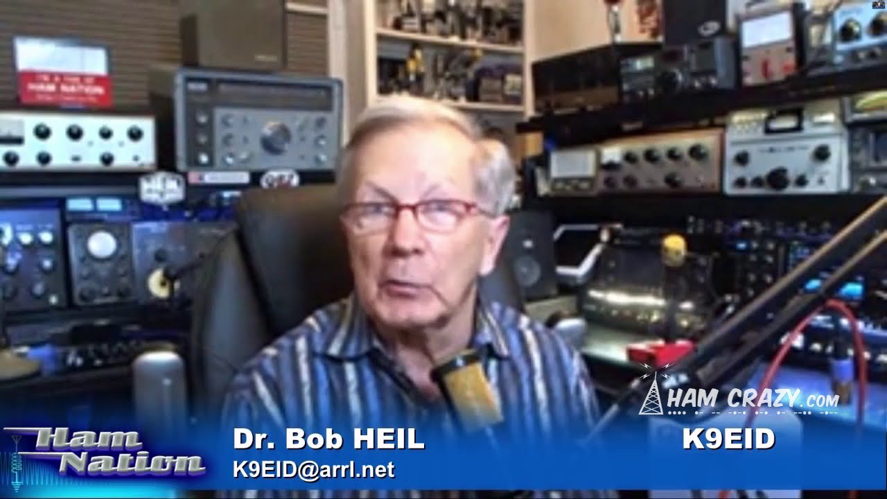 Bob Heil (K9EID) congratulates Holly Smith (KD0PLG) for earning her ...