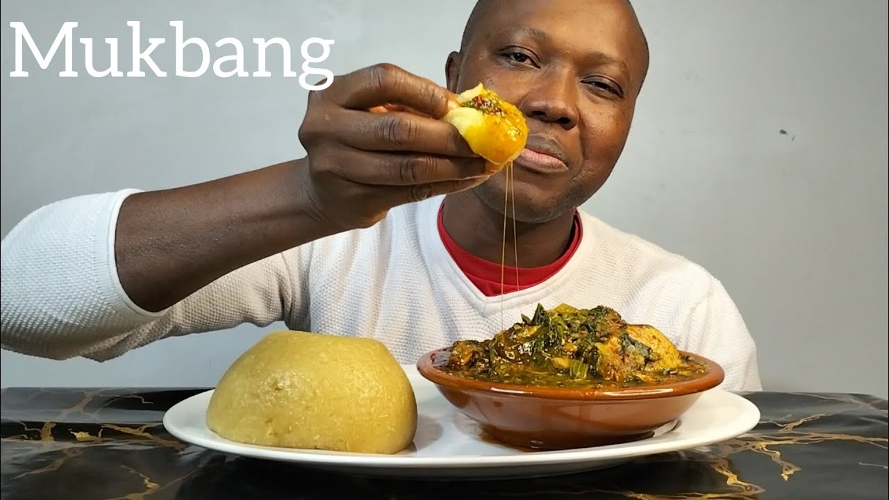 African asmr eating food pork fish vegetable okra soup with eba garri ...
