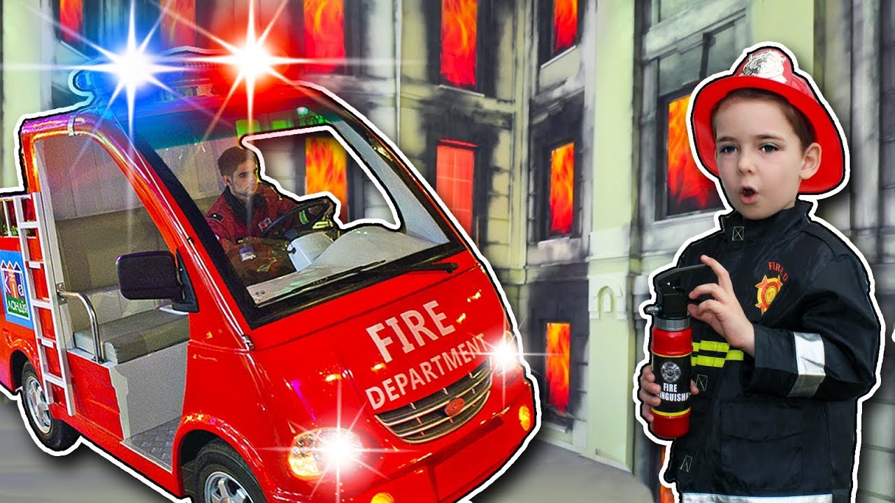 Child plays Firefighters at entertainment playground for children - YouTube
