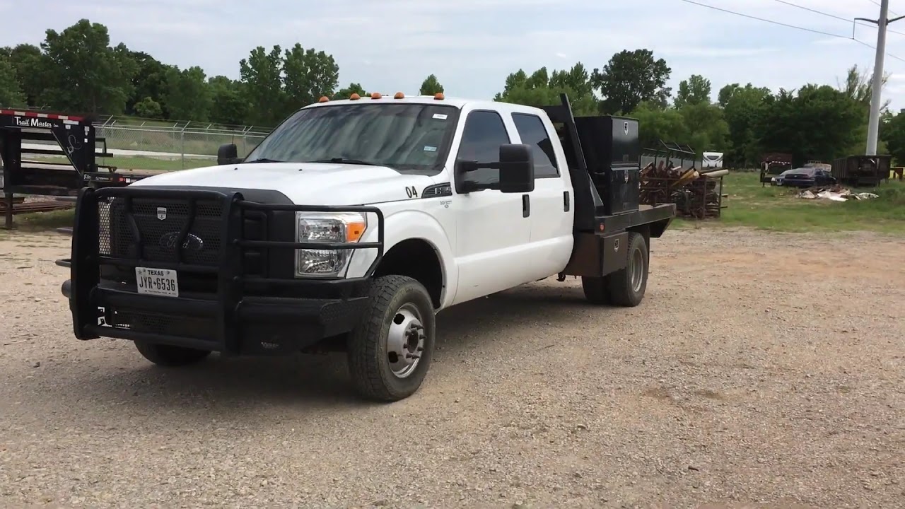 Lot 1077 - 2015 Ford F350 Super Duty Crew Cab 4x4 Flatbed Truck - YouTube