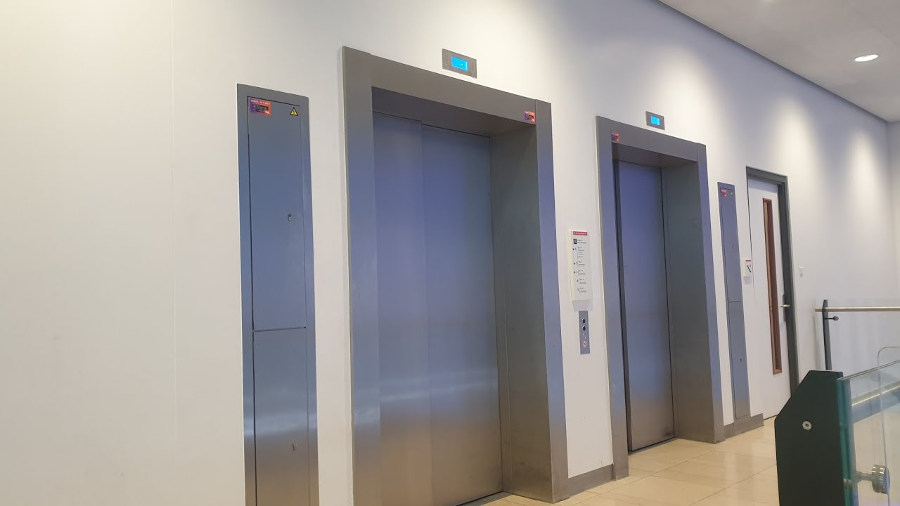 2 ThyssenKrupp Evolution Blue elevators. Parking garage P5, Hoog ...