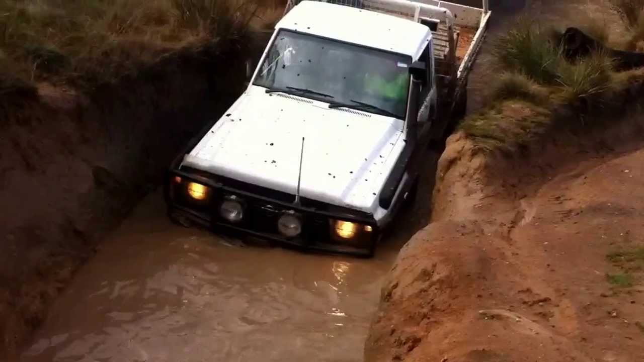 Nissan patrol 4wd stuck in bog hole - YouTube