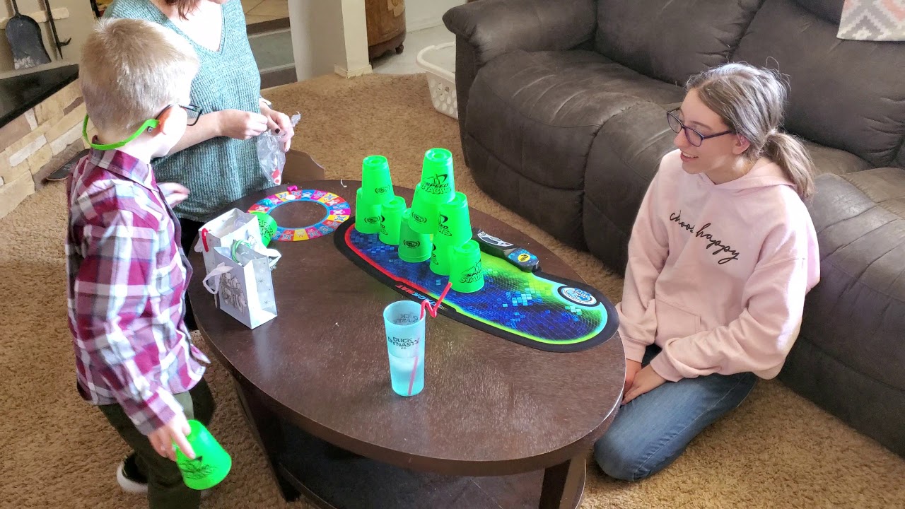Spencer playing cups with Hails - YouTube