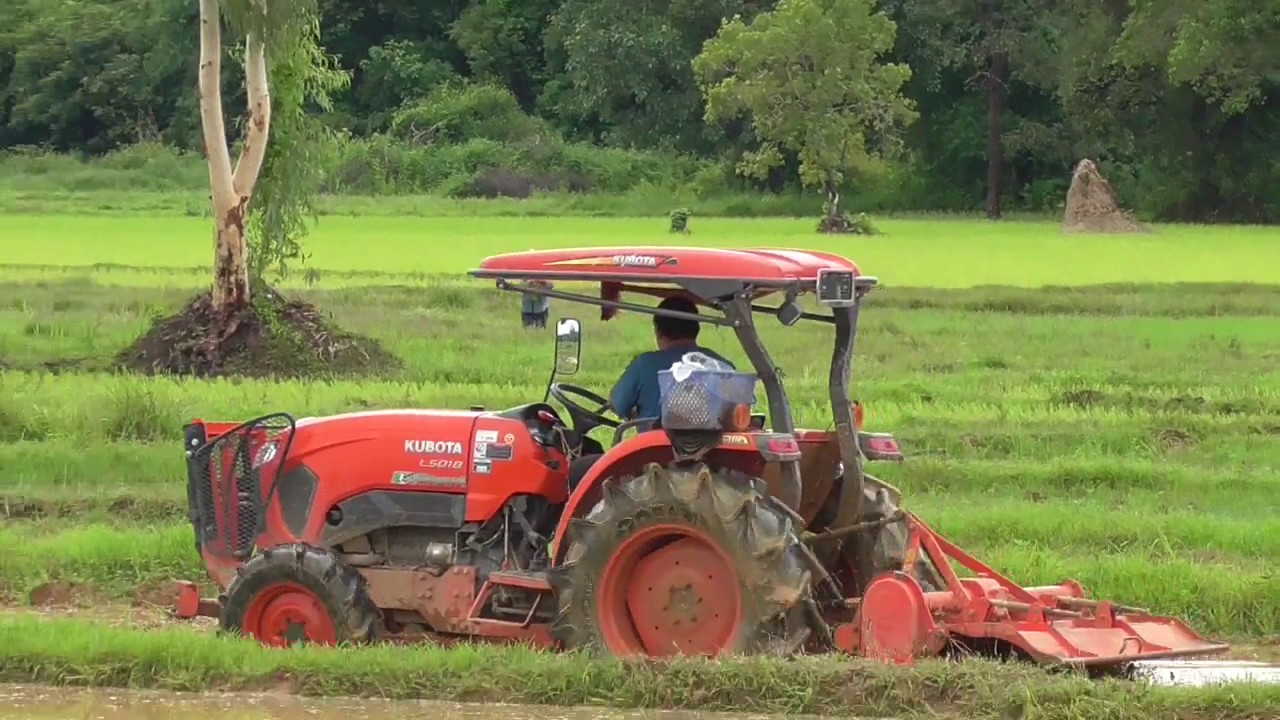 Kubota Tractors farming the fields in Thailand in Action - YouTube