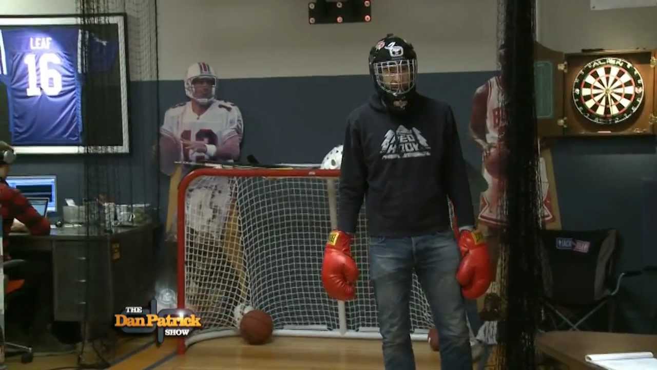 The Dan Patrick Show tests out their new Total Hockey Goalie Mask - YouTube