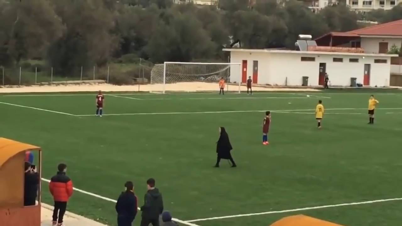 Old Woman crossing Football Field during game - YouTube