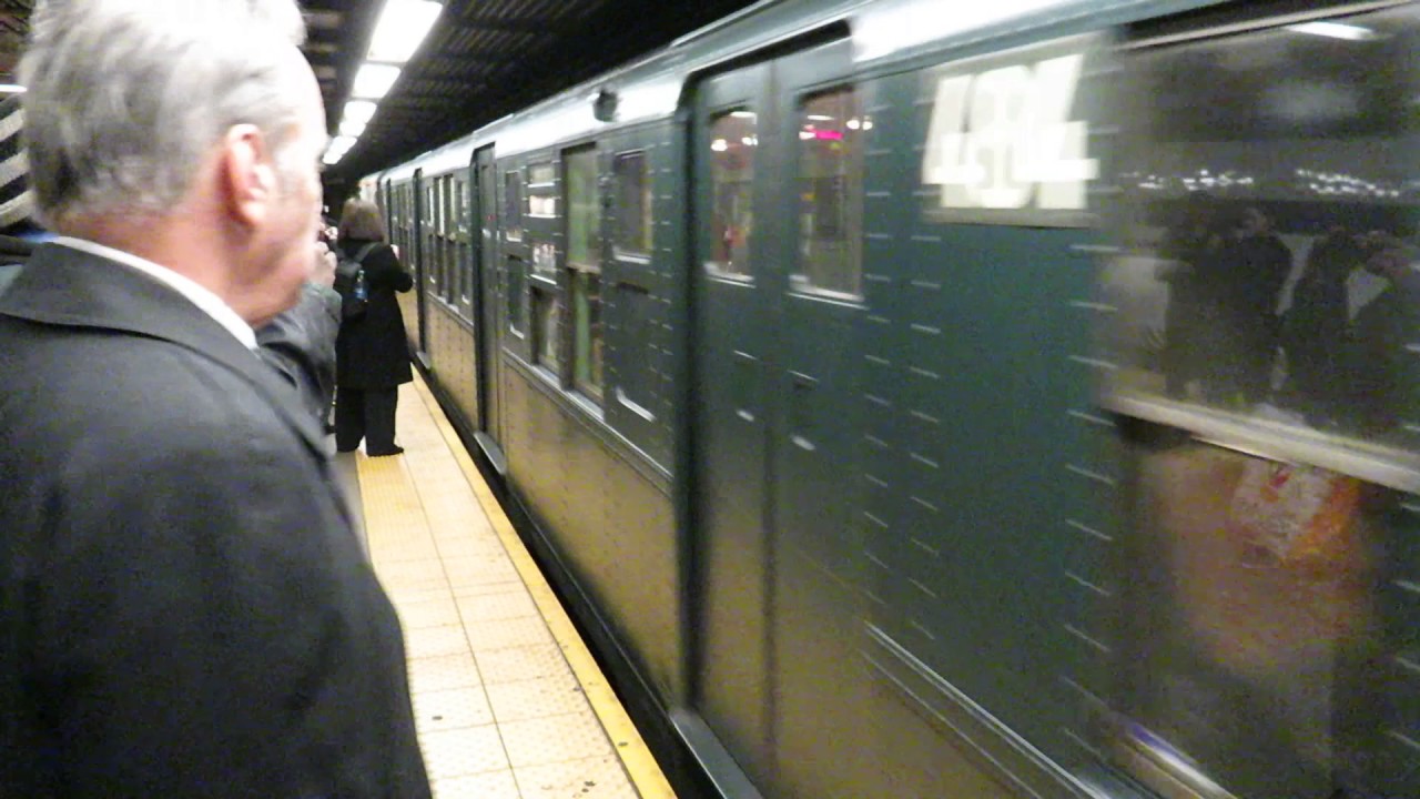 MTA NYCT R1-R9 Holiday Train Entering Queens Plaza - YouTube