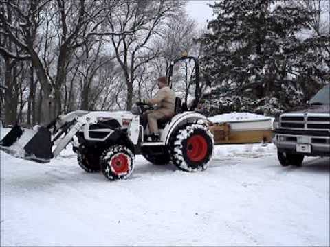 Plowing the Driveway With a Bobcat CT230 - YouTube