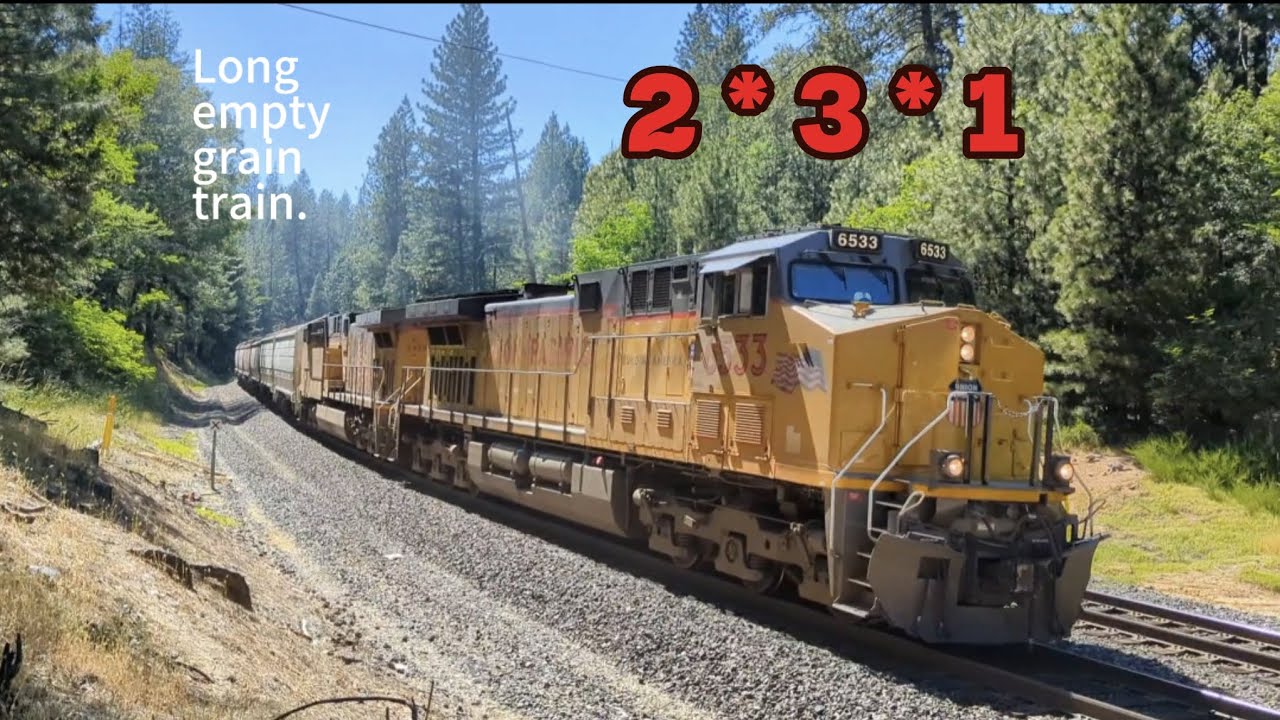 Long Union Pacific empty grain train working against grade in gold run CA. - YouTube