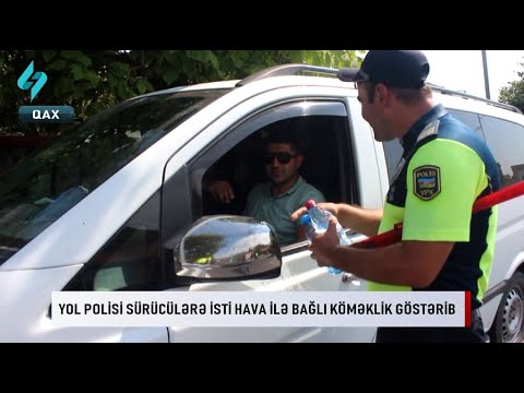 Yol polisi suruculere isti hava ile bagli komeklik gosterib... | Kanal S Xeber
