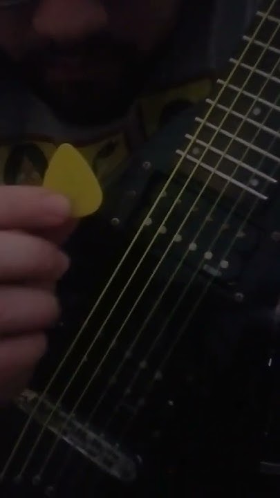 messing around with Crown of Barbed Wire riffs. yellow strings and yellow pick for 72 seasons ...