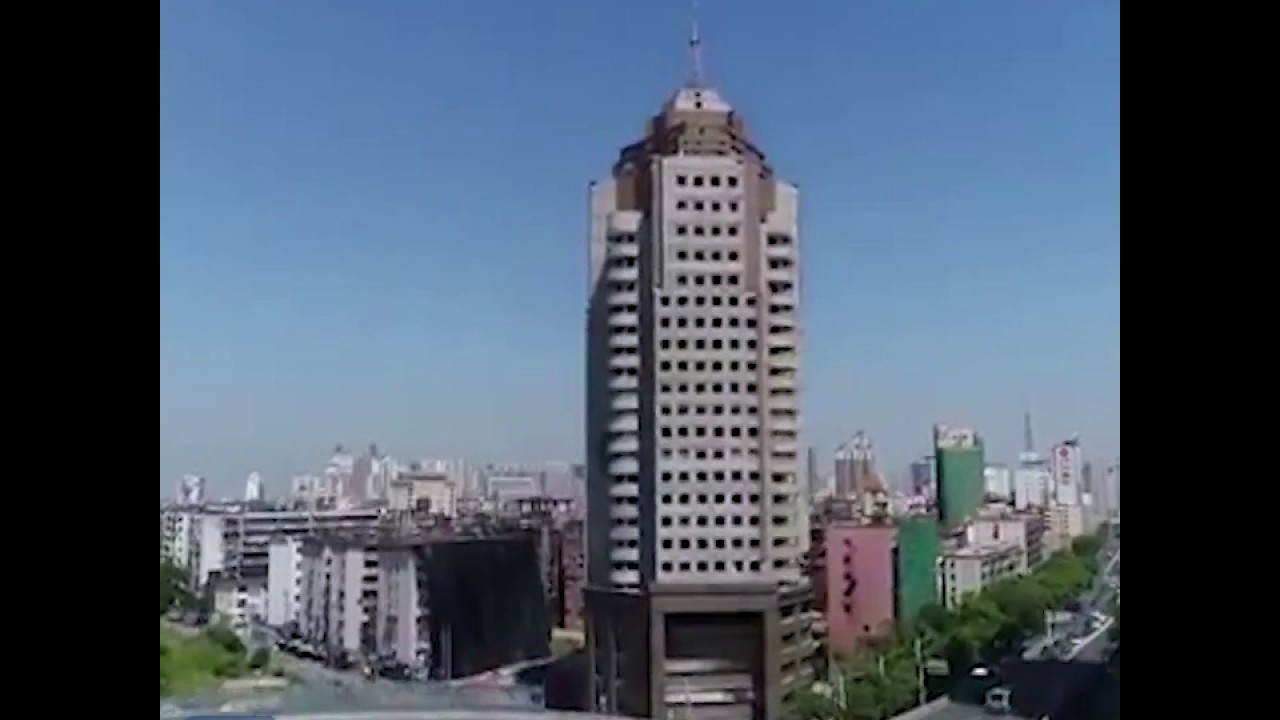 26-story building demolished in 6 seconds in Nanchang, China - YouTube
