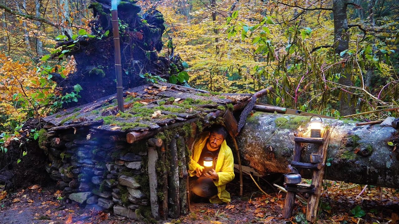 Survival Camping in HEAVY RAIN; Bushcraft Shelter UNDER FALLEN TREE ...
