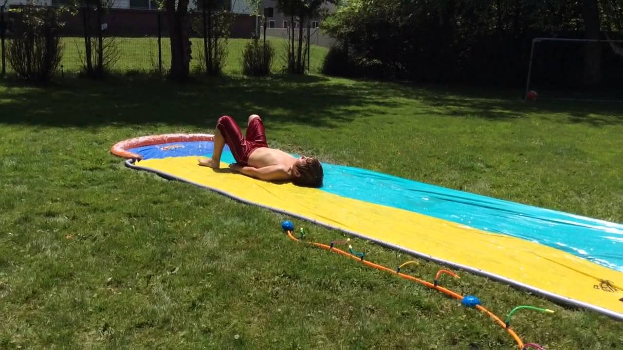 Ben's backwards crab moves on our dinky slip & slide - YouTube