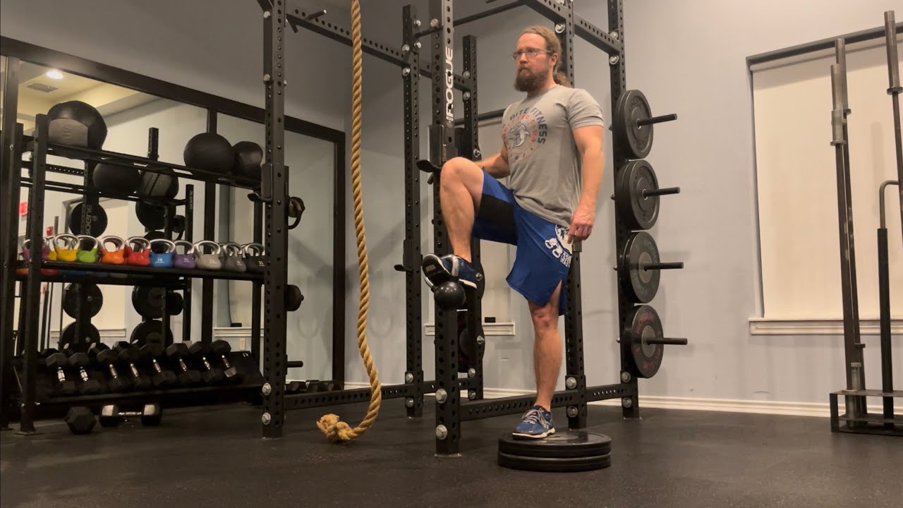 Standing Hip Flexion (March) with Kettlebell Exercise Demonstration ...