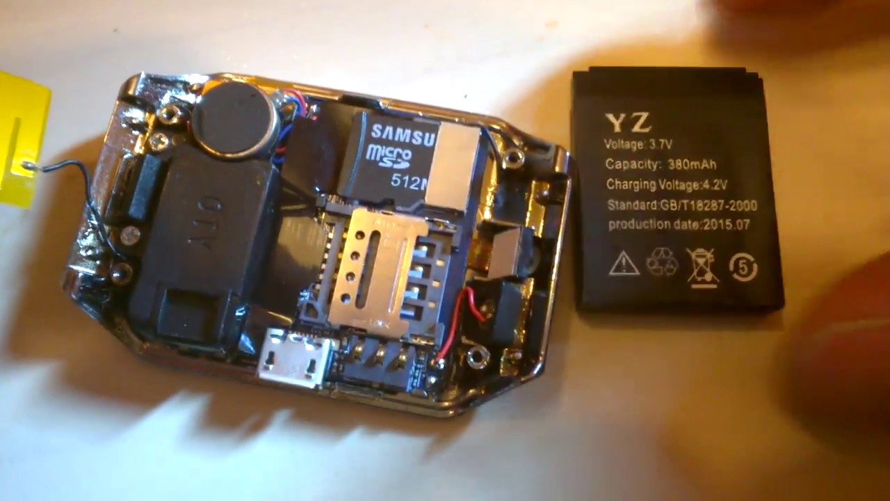 Disassembling a cheap smart watch - YouTube