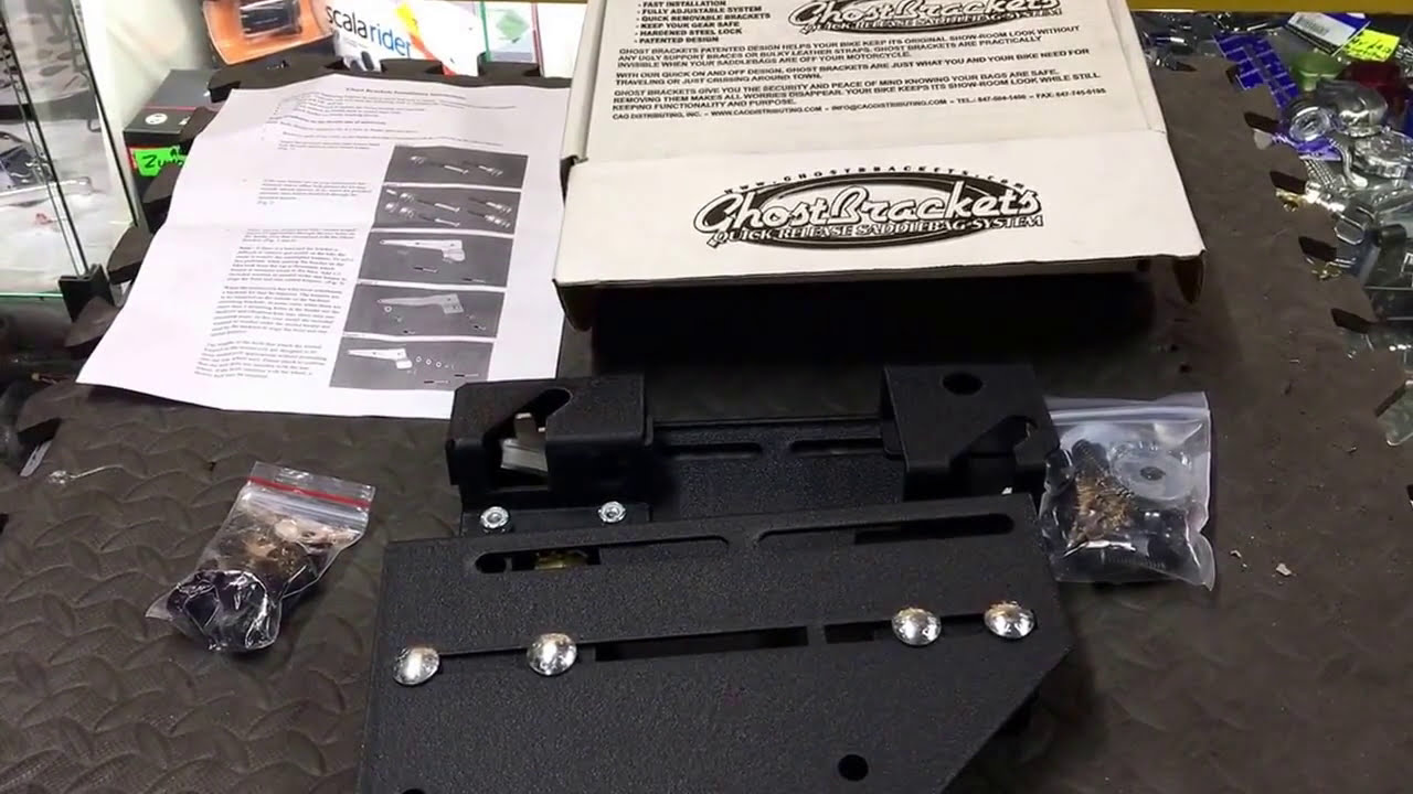 Ghost. Brackets for motorcycle Saddlebags lock bags to bike quick ...