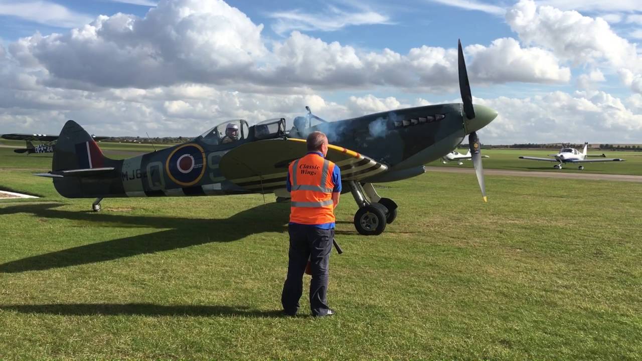 Spitfire engine start up at duxford - YouTube