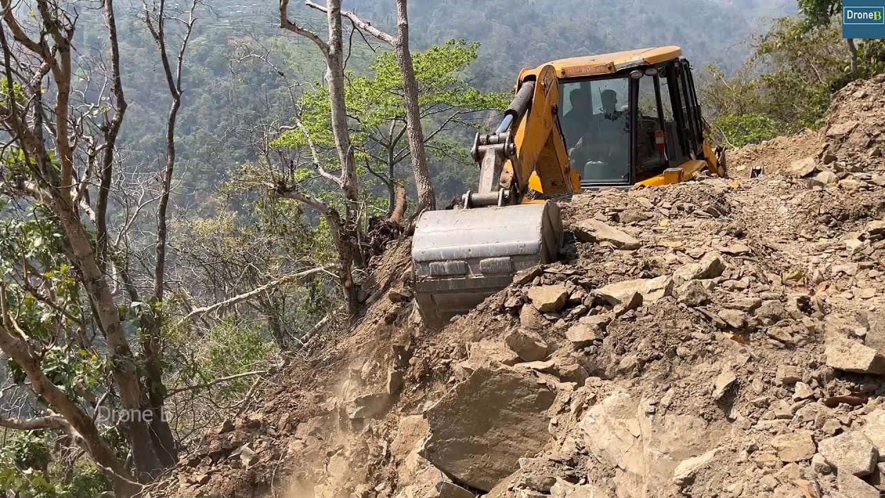 Terrible Windy Day, Clattering Rolling Rock Sounds with JCB Backhoe ...