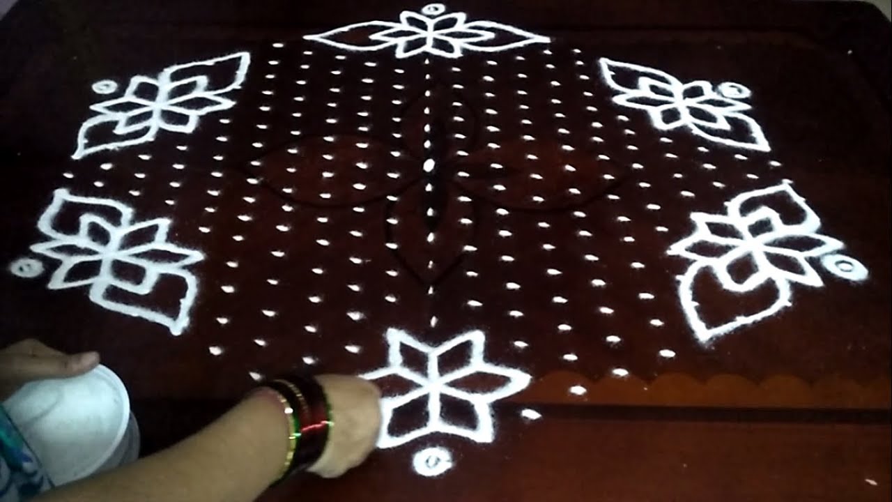 Beautiful Flowers and Shanque Rangoli Designs with 21x11 middle for ...