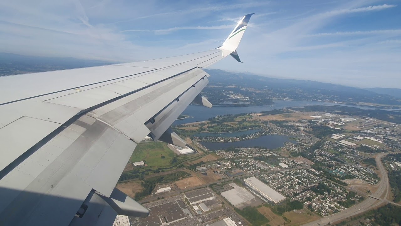 Alaska Airlines 737-900 ER landing at PDX (window view) - YouTube