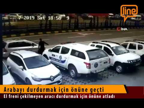 El freni çekilmeyen aracı durdurmak için önüne atladı!
