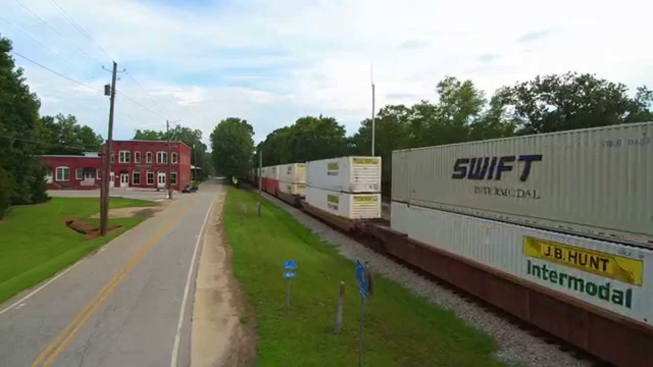 BNSF 7415 pulling piggy backs and double stacks - YouTube