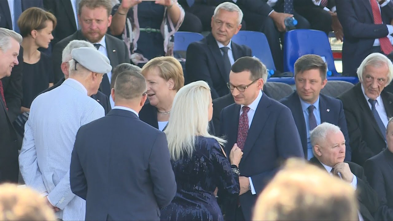 Merkel, Pence and other officials arrive at WWII commemoration ceremony ...