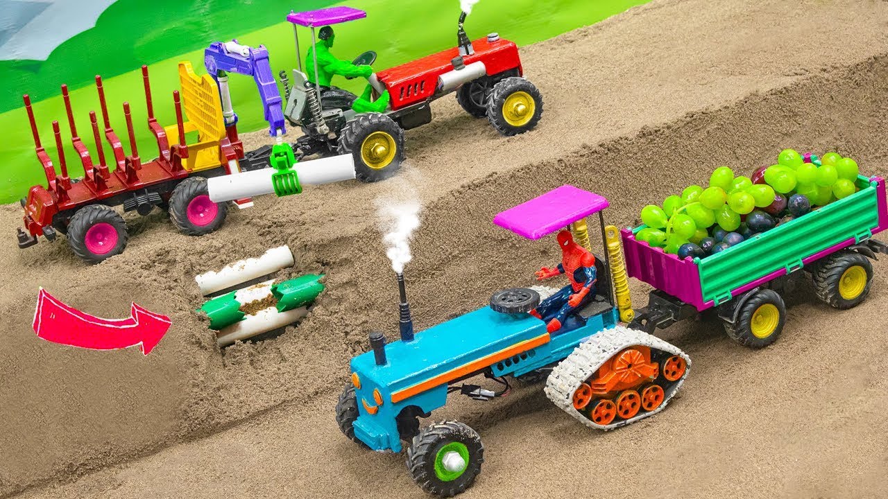 DIY tractor making mini bulldozer to road repair with many round pipes ...