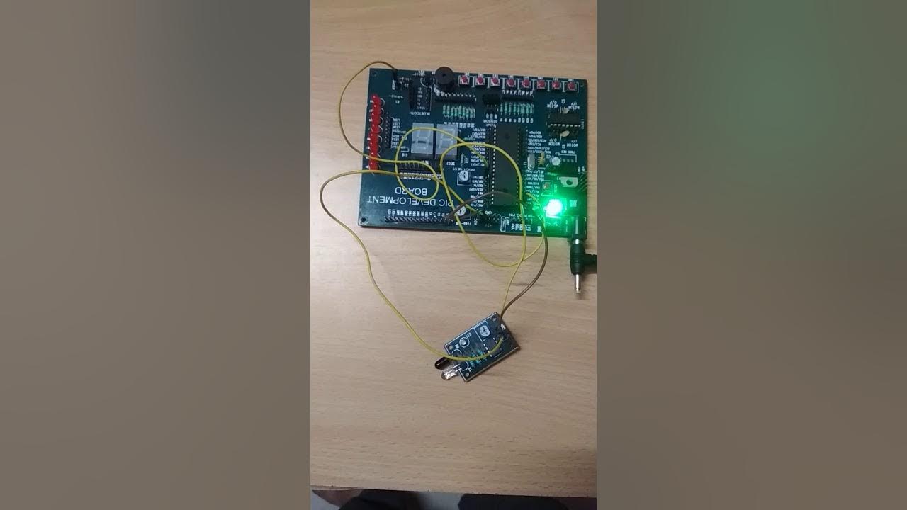 Interfacing of PIC18f458 Microcontroller with IR Sensor and Buzzer - YouTube
