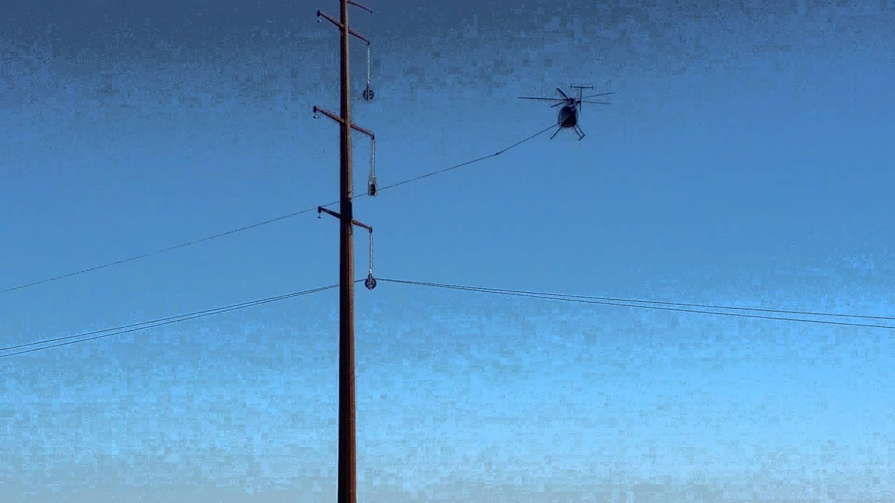Helicopter hanging cables - YouTube