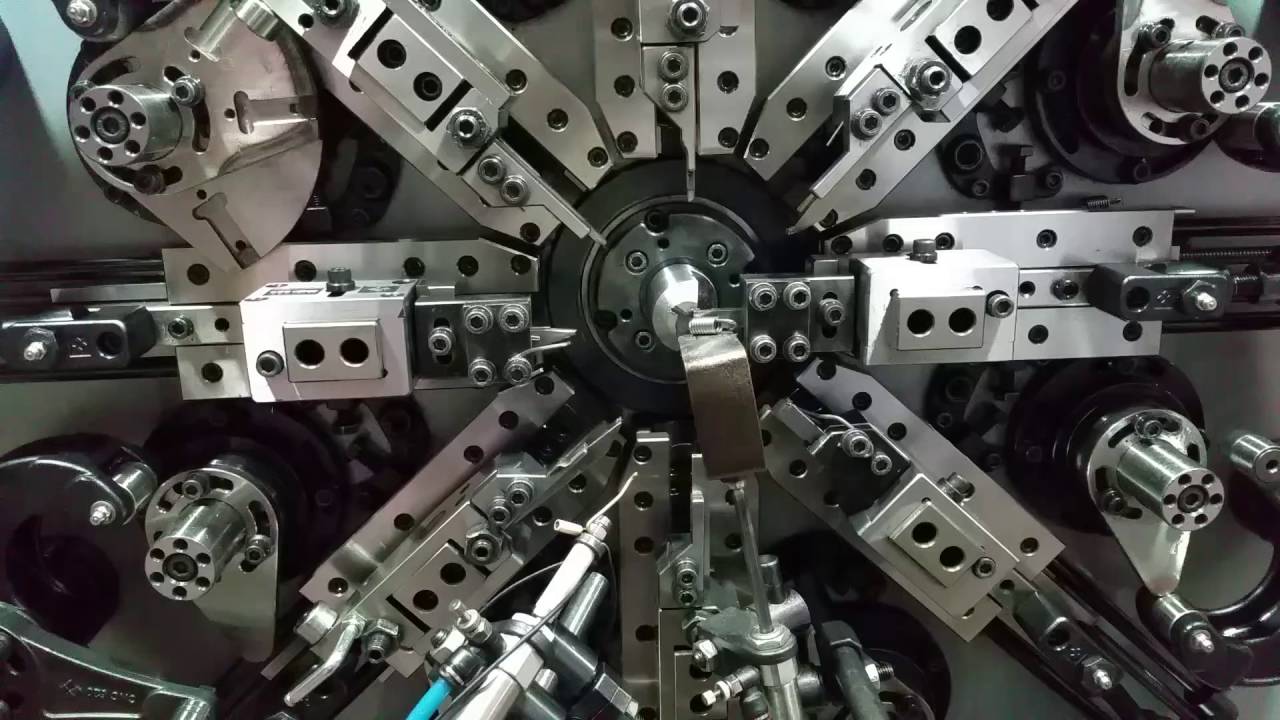 CNC machine spring forming - YouTube