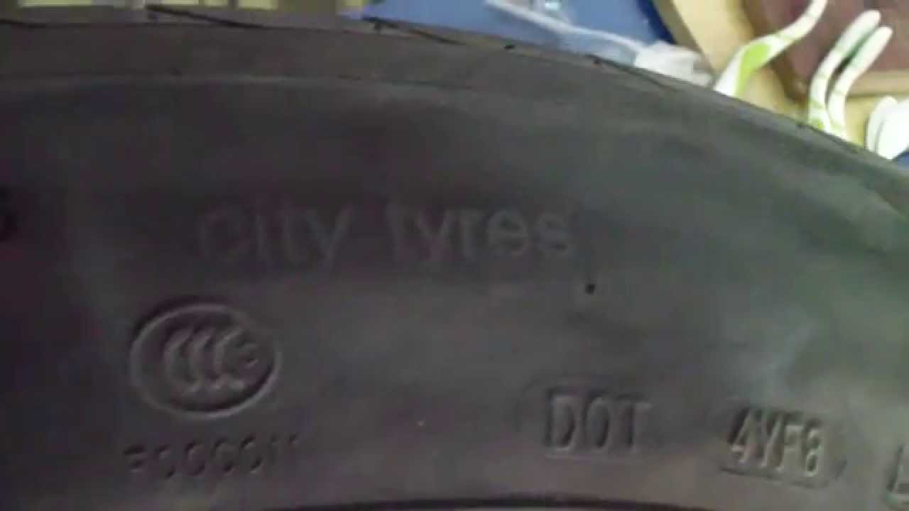 20W fiber laser marking machine on tyre without rim - YouTube
