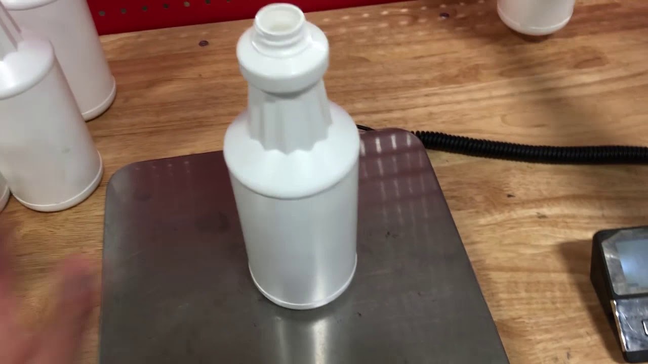 Over Flow Filler with diaphragm pump and double manifold - YouTube