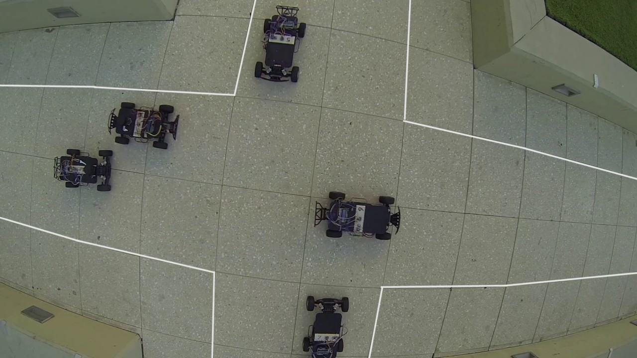 Crossroads Autonomous Intersection 8 Vehicle Demo - YouTube